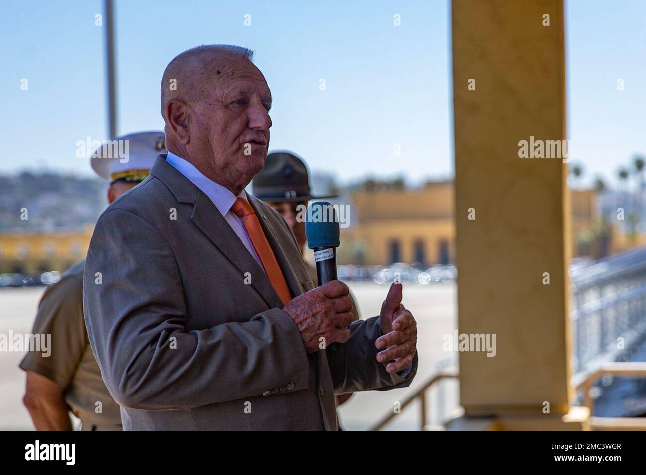 U.S. Marine Corps Major General (Ret.) Ray L. Smith presents the Bronze ...