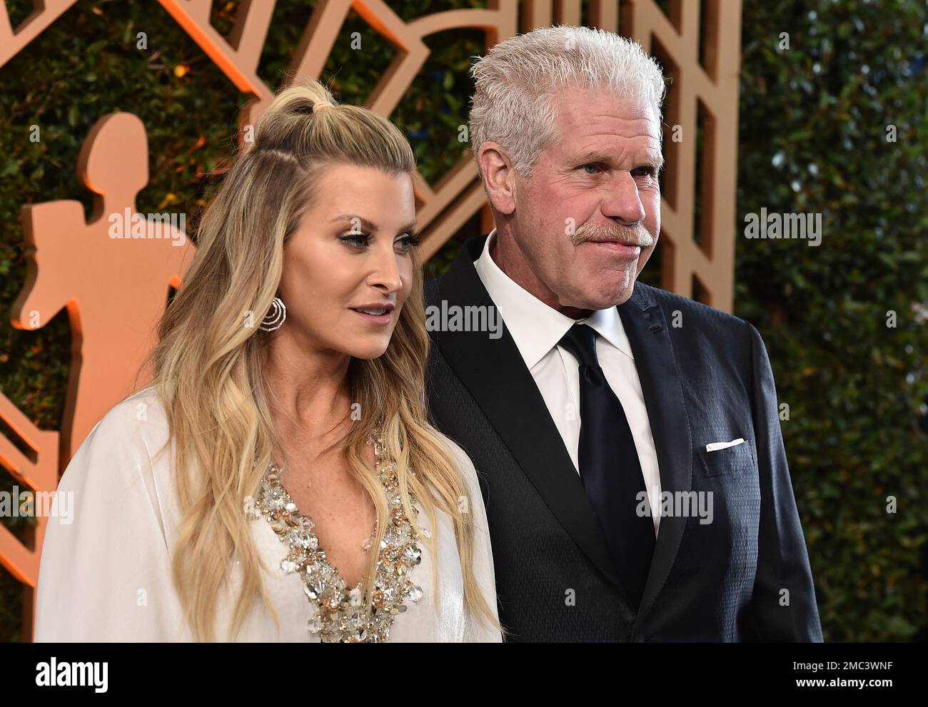 Allison Dunbar, left, and Ron Perlman arrive at the 28th annual Screen ...