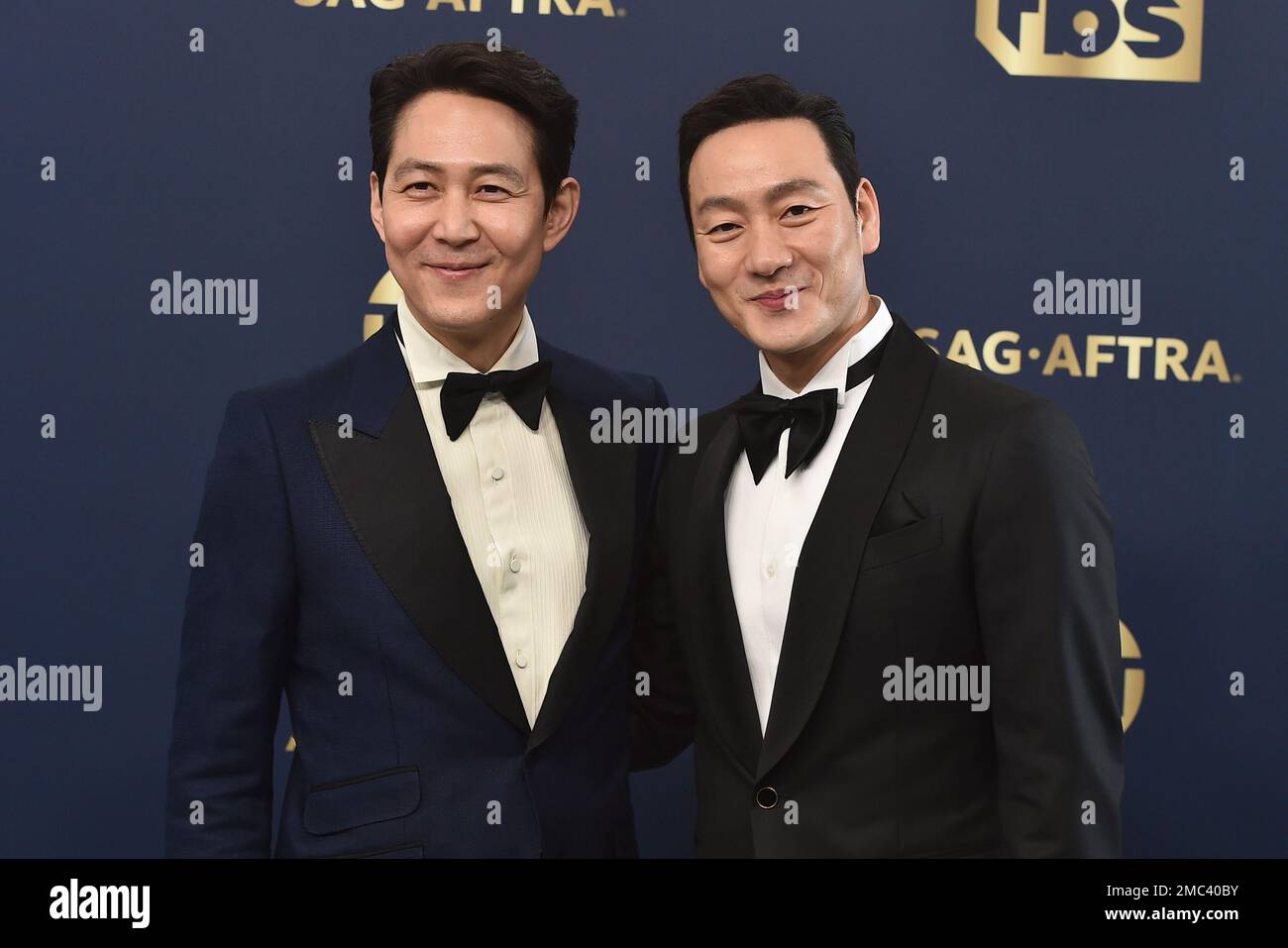 Lee Jung-jae, left, and Park Hae-soo arrive at the 28th annual Screen Actors Guild Awards at the ...