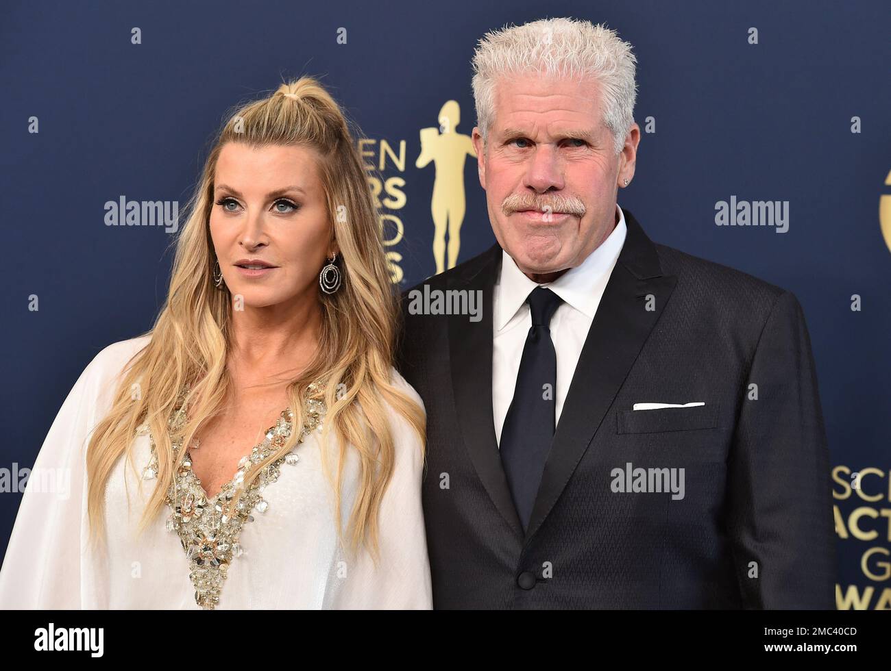 Allison Dunbar, and Ron Perlman, right, arrive at the 28th annual ...