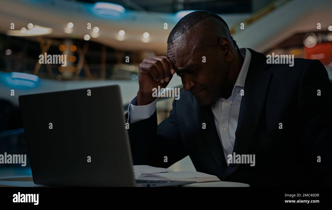 Middle-aged ethnic stressed worried African American man has problem ...