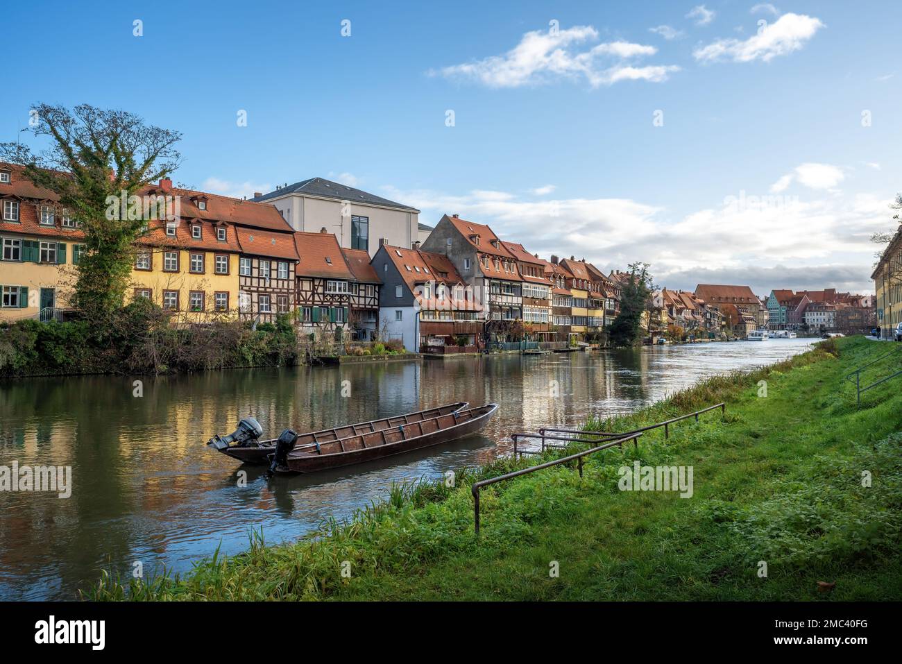 Regnitz River riverbank with small boats and old houses - Bamberg ...