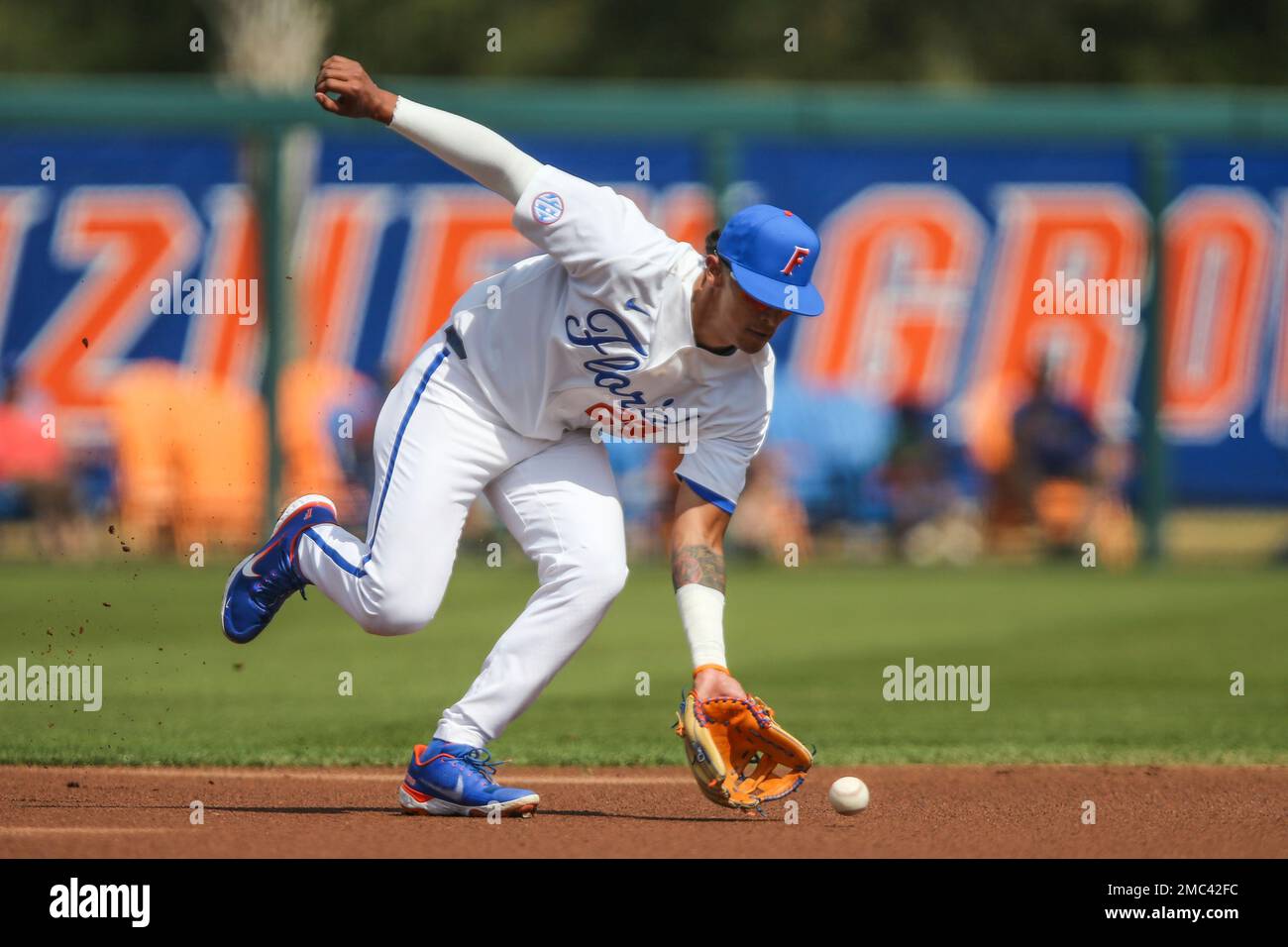 Florida infielder Josh Rivera (24) fields the ball during an NCAA ...