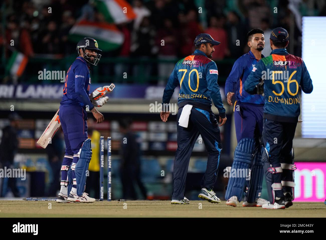 India's Ravindra Jadeja, left, smiles as batting partner Shreyas Iyer ...
