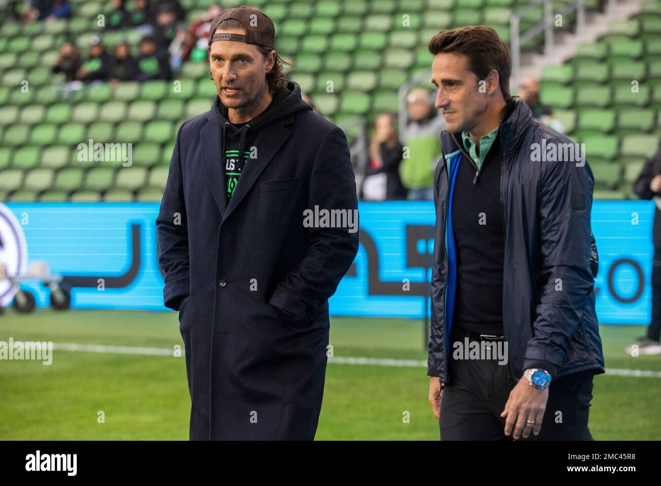 Actor Matthew McConaughey, left, speaks with Austin FC head coach Josh ...