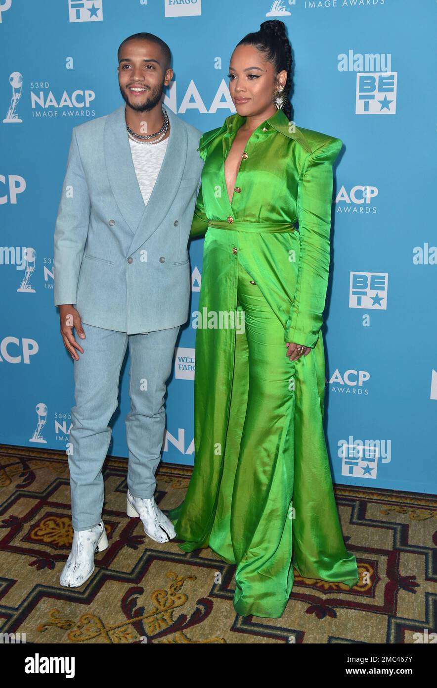 Nic Ashe, left, and Bianca Lawson arrive at the 53rd NAACP Image Awards ...