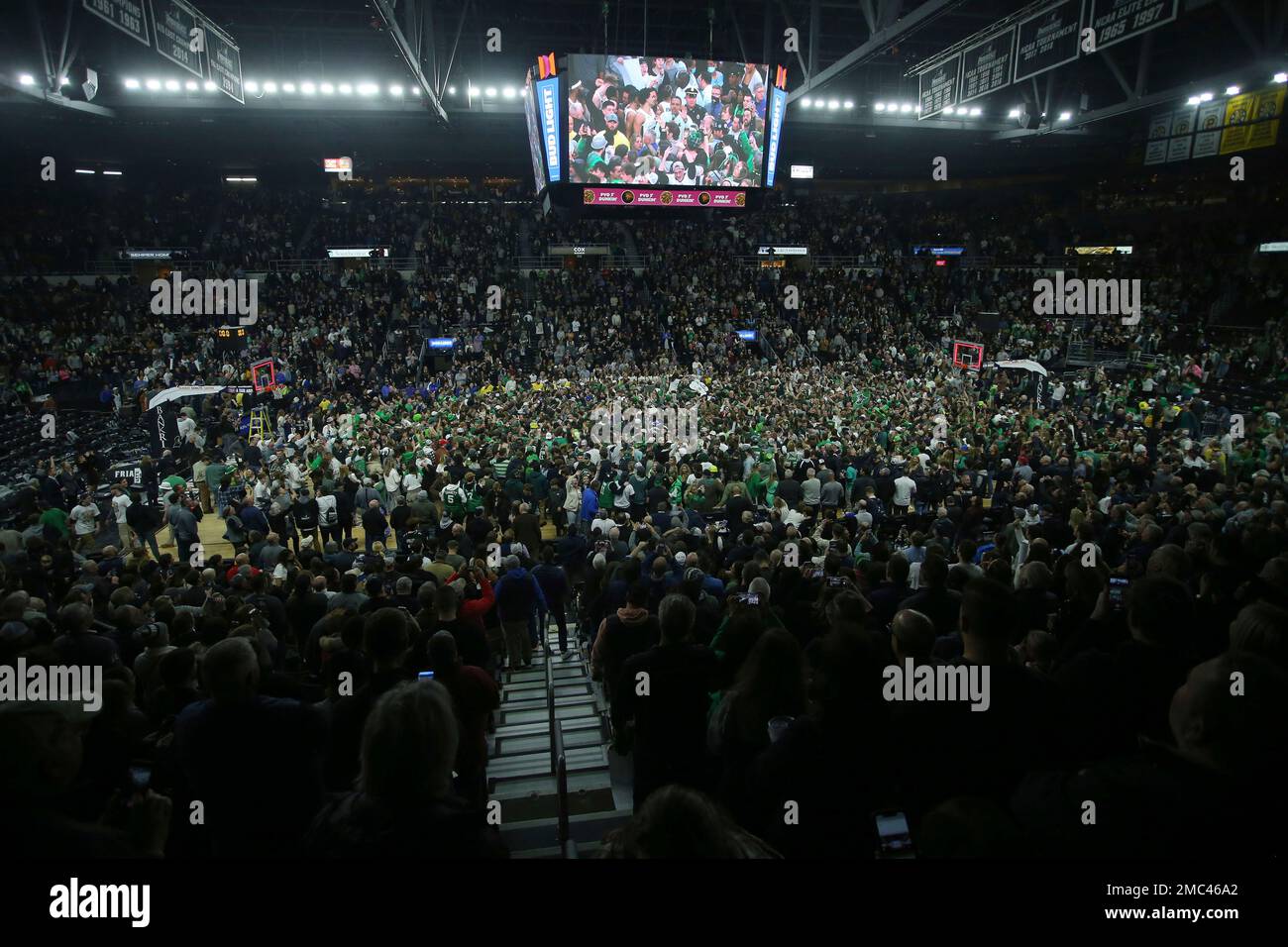 Ncaa Basketball Fans Storming The Court