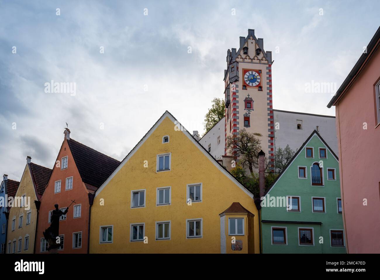 Colorful houses at Fussen Old Town (Altstadt) with High Castle (Hohes ...