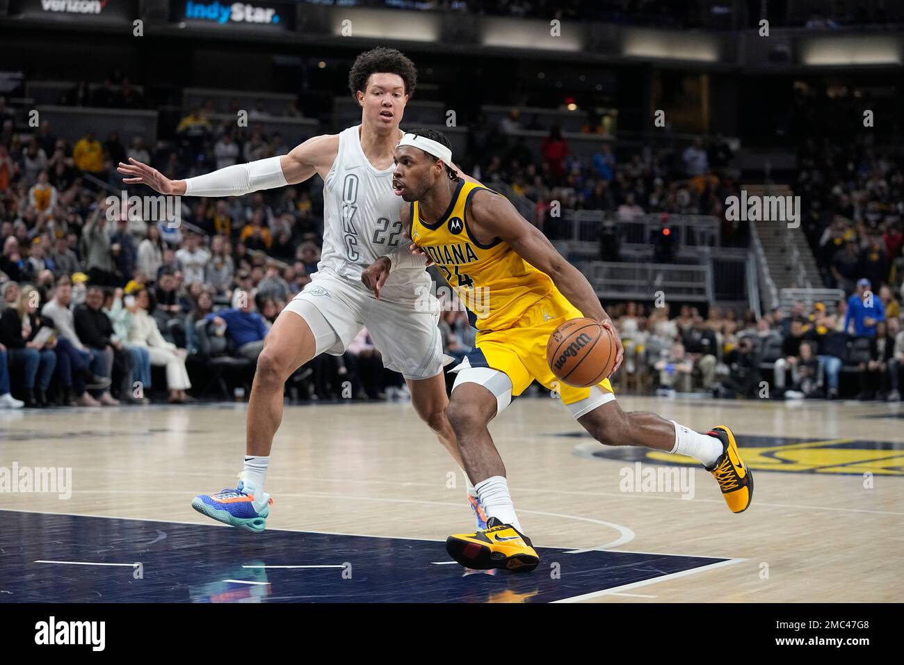 Indiana Pacers' Buddy Hield (24) is defended by Oklahoma City Thunder's ...