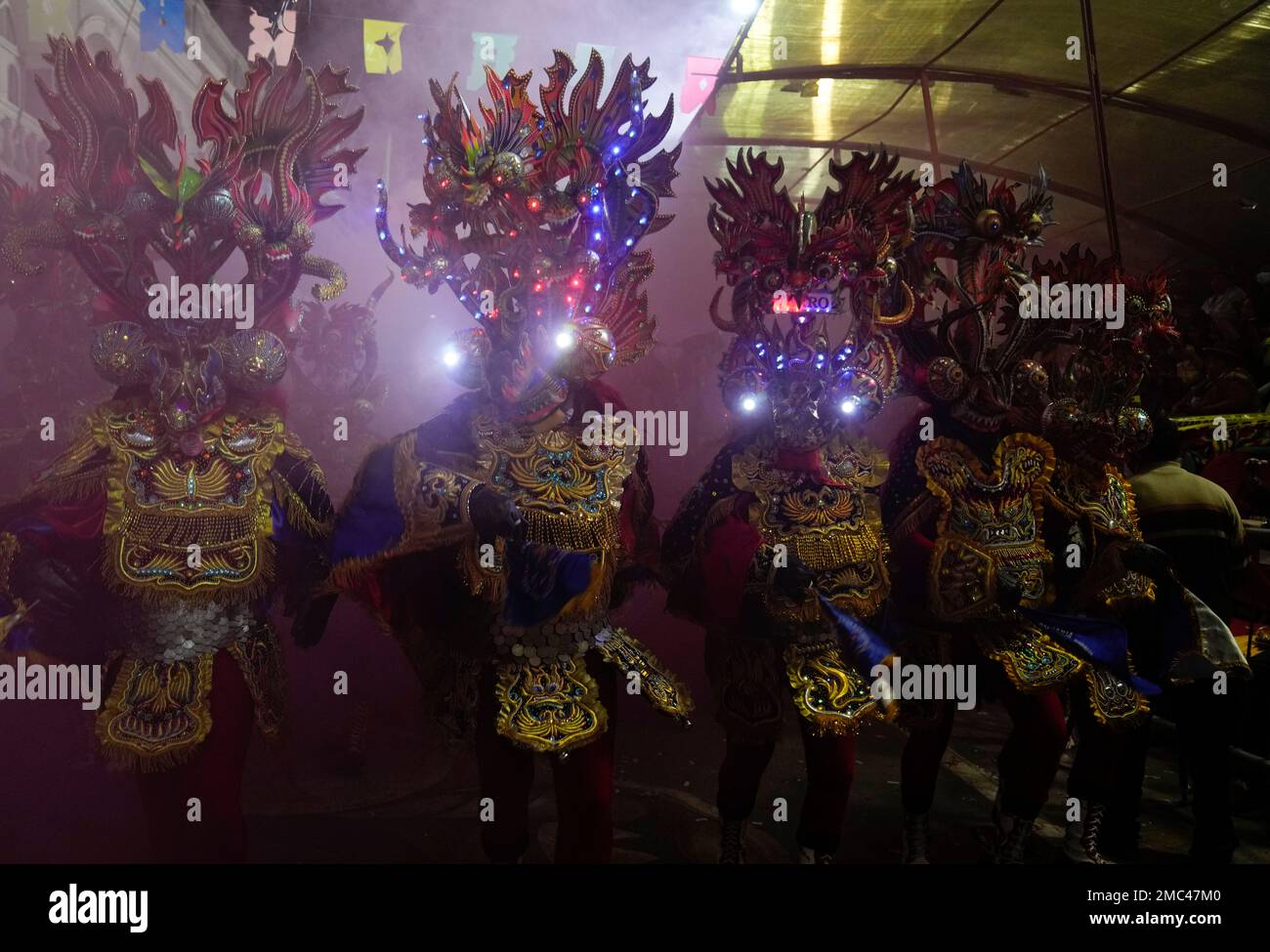 Dancers perform the traditional "Diablada," or Dance of the Devils ...