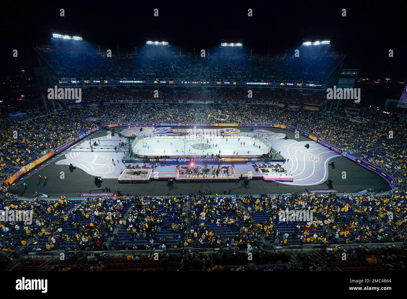 Players warm up at Nissan Stadium before an NHL Stadium Series hockey ...