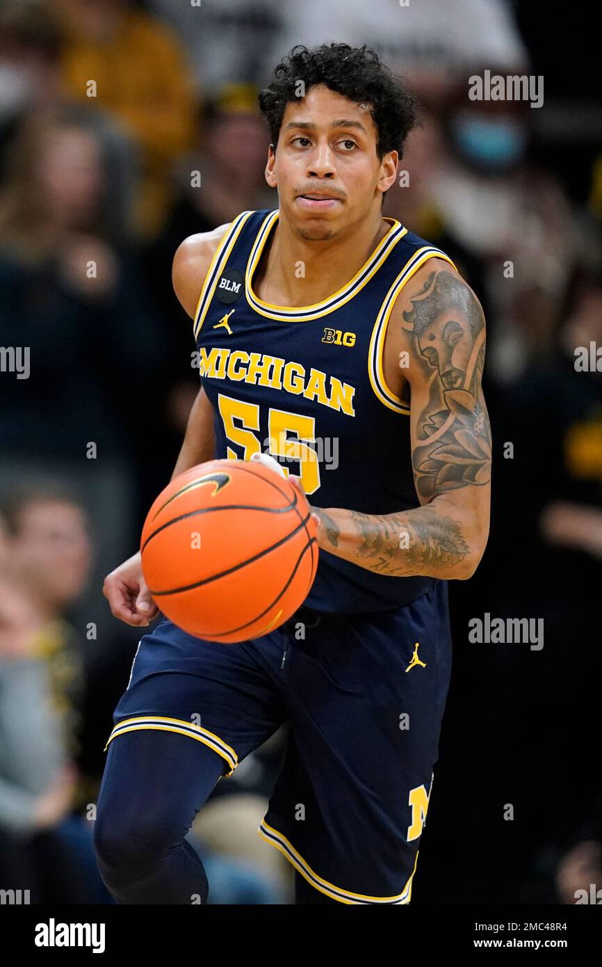 Michigan guard Eli Brooks drives up court during the first half of an ...
