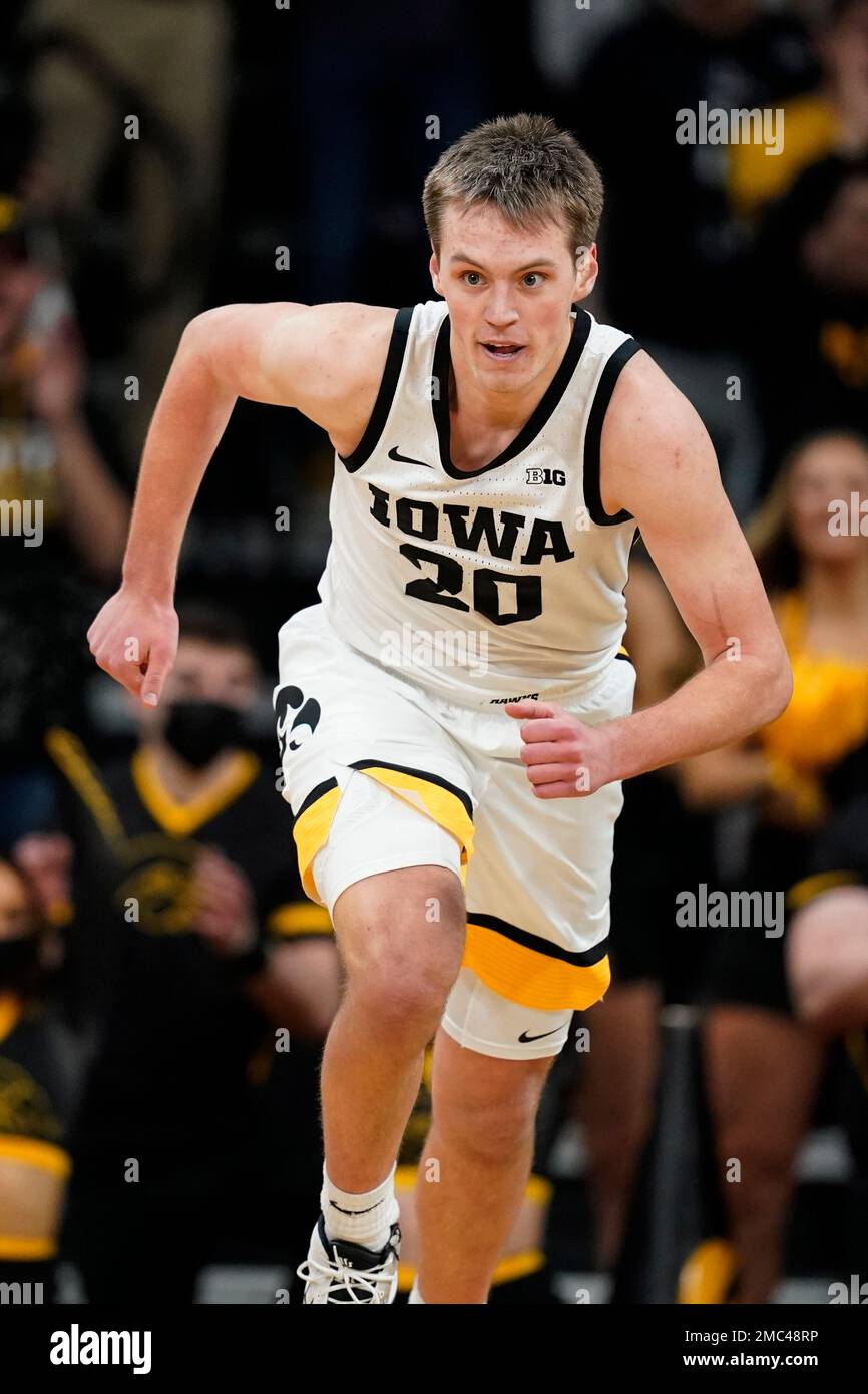 Iowa guard Payton Sandfort runs up court during the first half of an ...