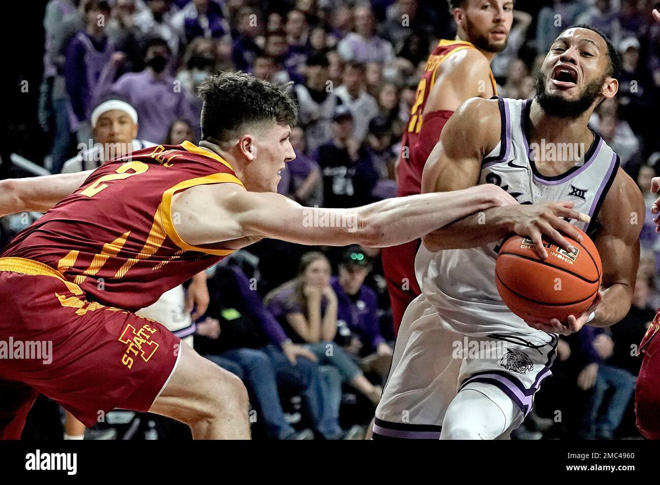 Iowa State guard Caleb Grill (2) tries to steal the ball from Kansas ...
