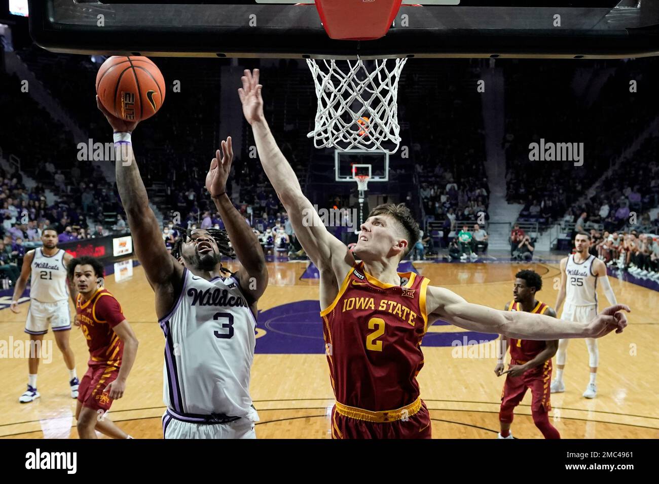 Iowa State guard Caleb Grill (2) tries to block a shot by Kansas State ...