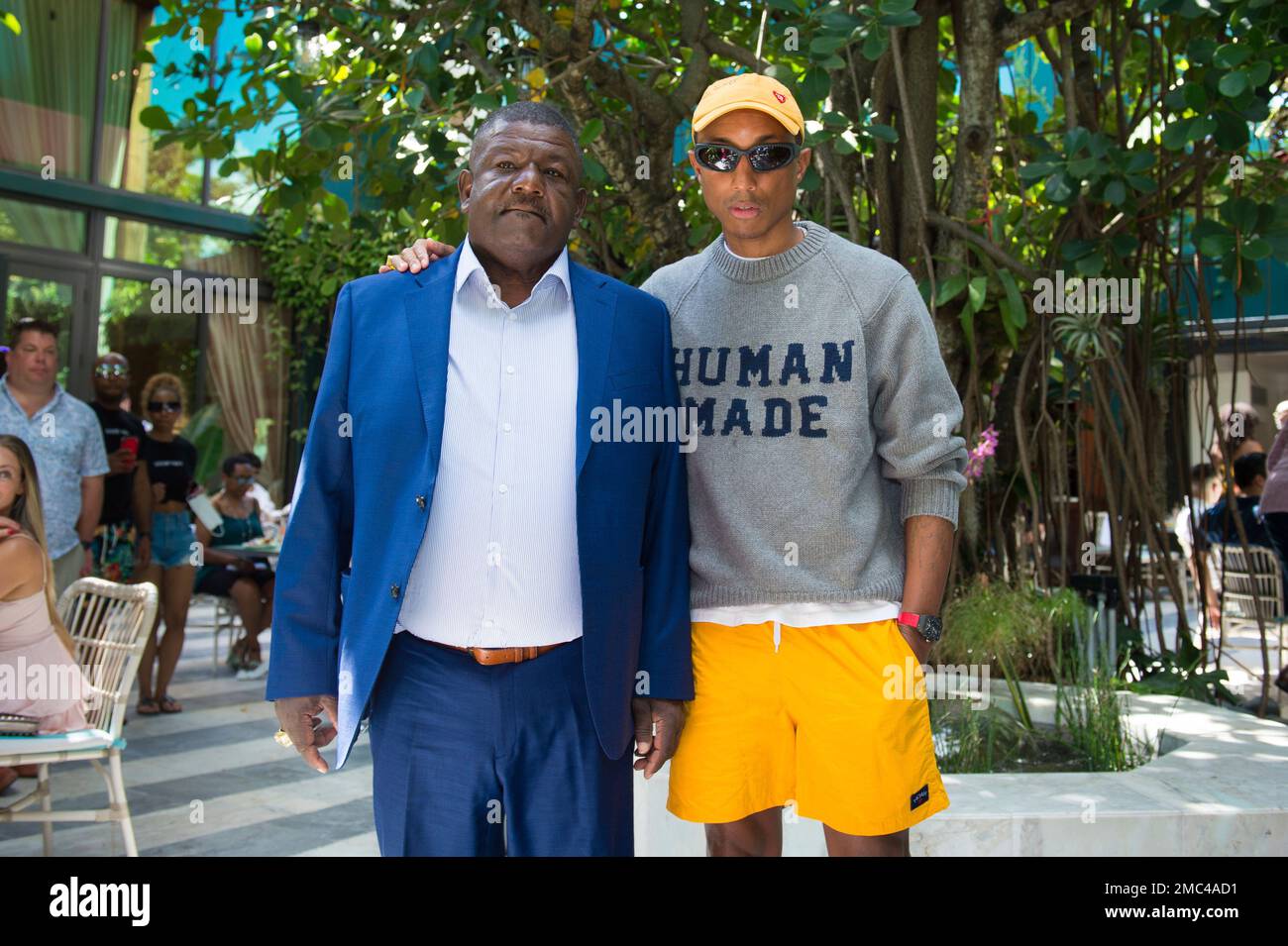 Pharoah Williams, left, and Pharrell Williams attend Williams Family Kitchen Soul Food Brunch ...