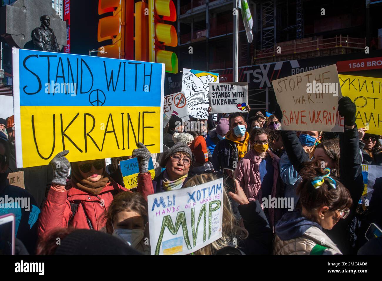 People gather in Times Square to denounce the Russian invasion of ...