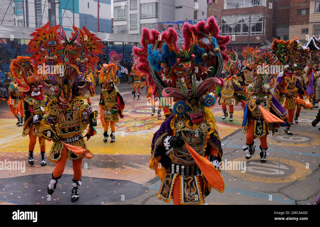 Dancers perform the traditional "Diablada," or Dance of the Devils ...