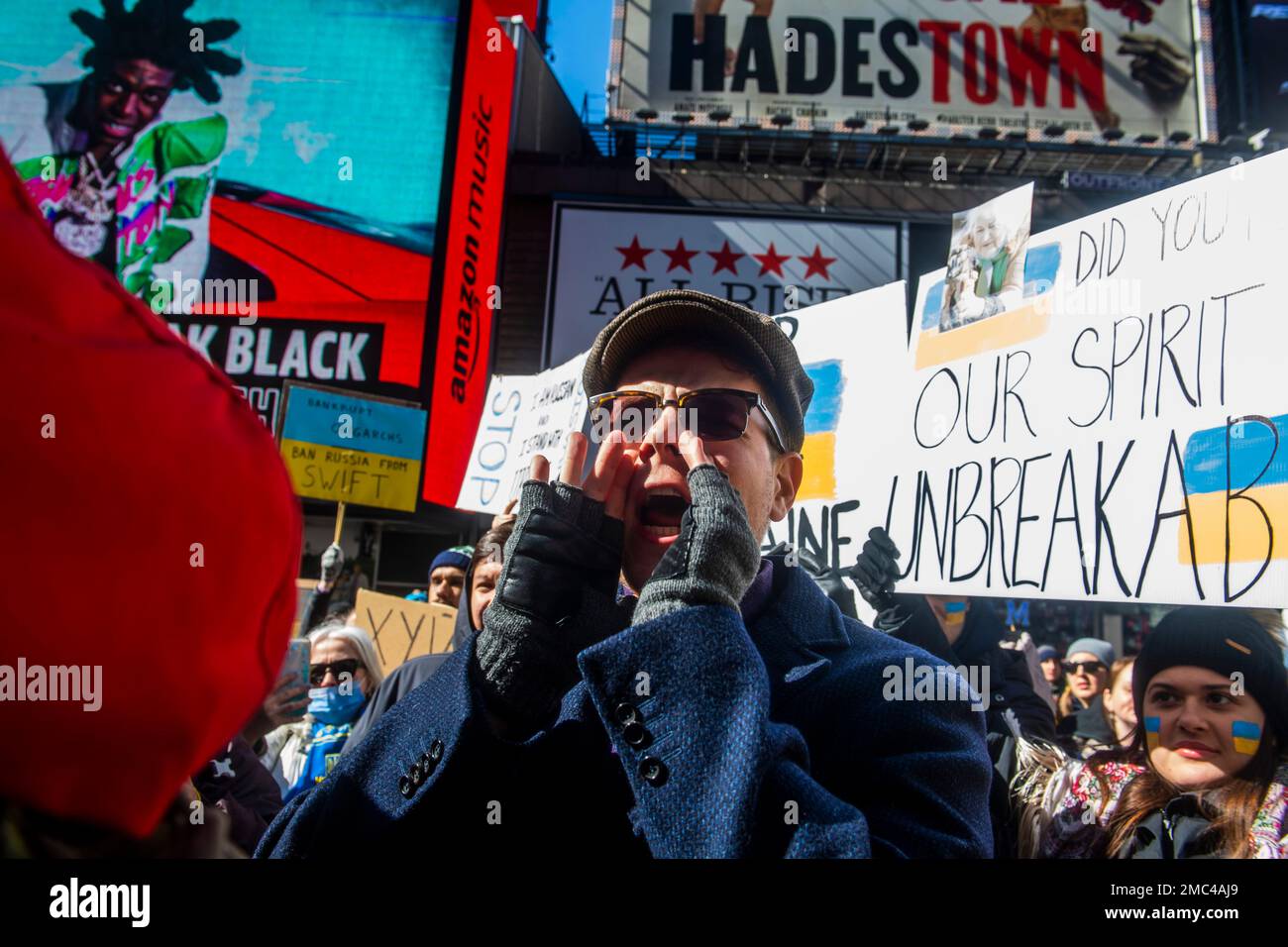 People gather in Times Square to denounce the Russian invasion of ...