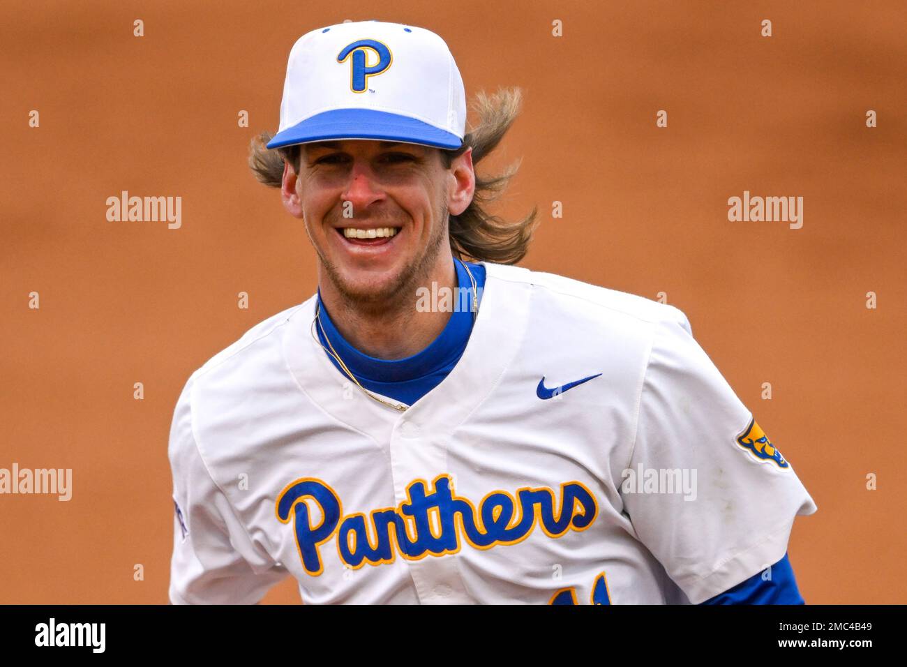 Pittsburgh player Brock Franks competes in an NCAA baseball game ...
