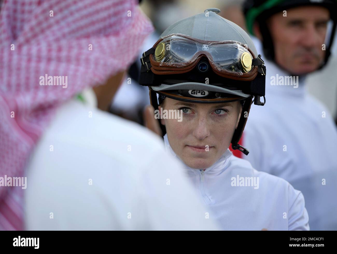 Jockey Jessica Pyfer listens in a pre-race briefing during the ...