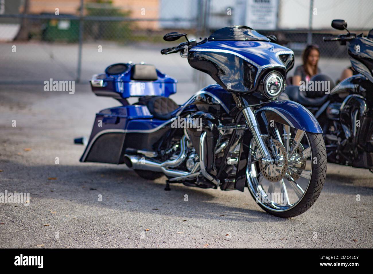 A beautiful blue harley davidson street glide 2010 parked on the street ...