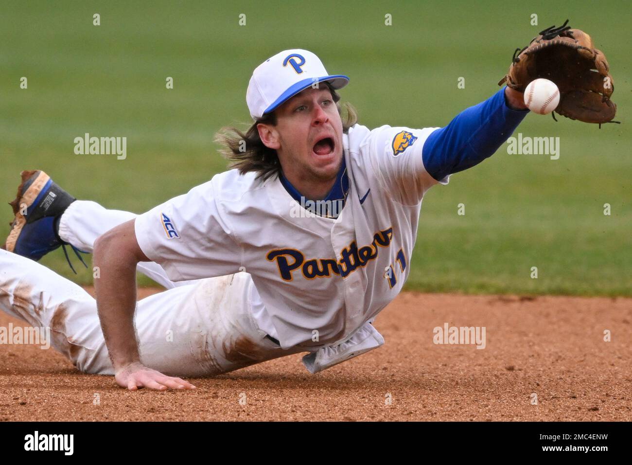 Pittsburgh shortstop Brock Franks tosses the ball with his glove hand ...