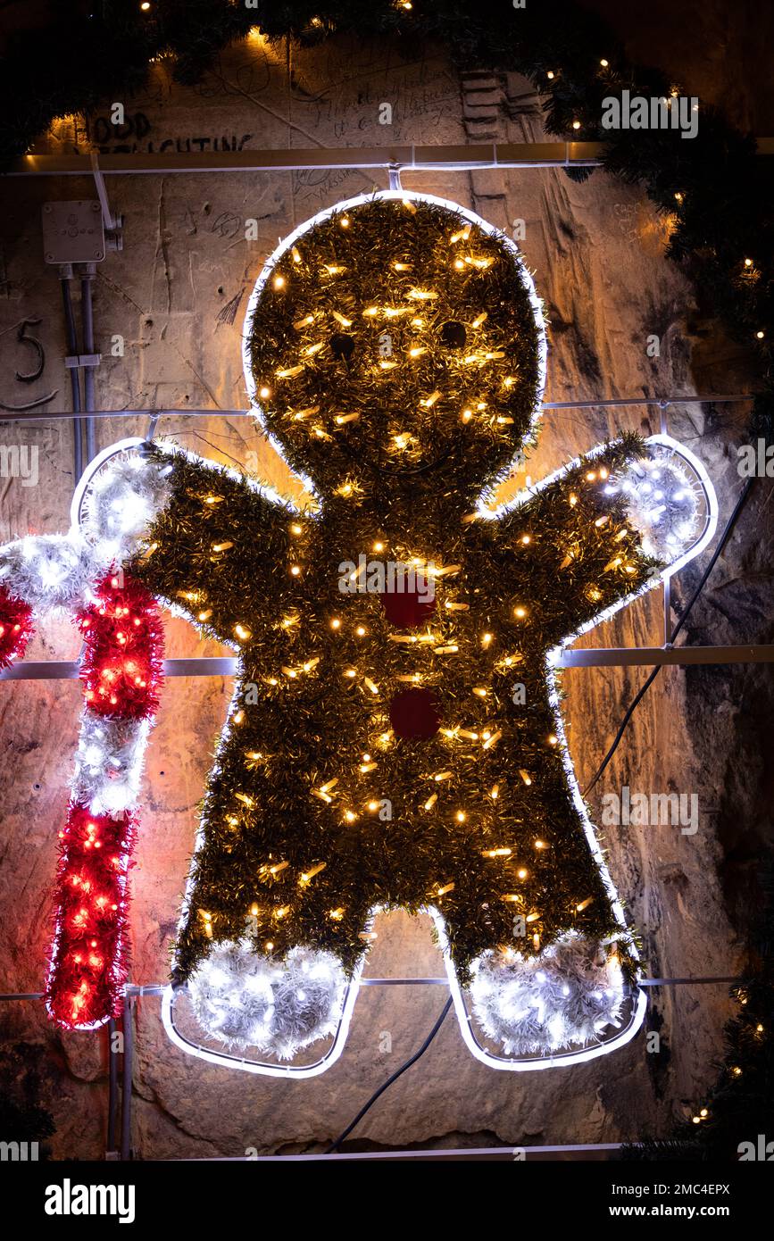 Gingerbread man with candy cane Stock Photo - Alamy