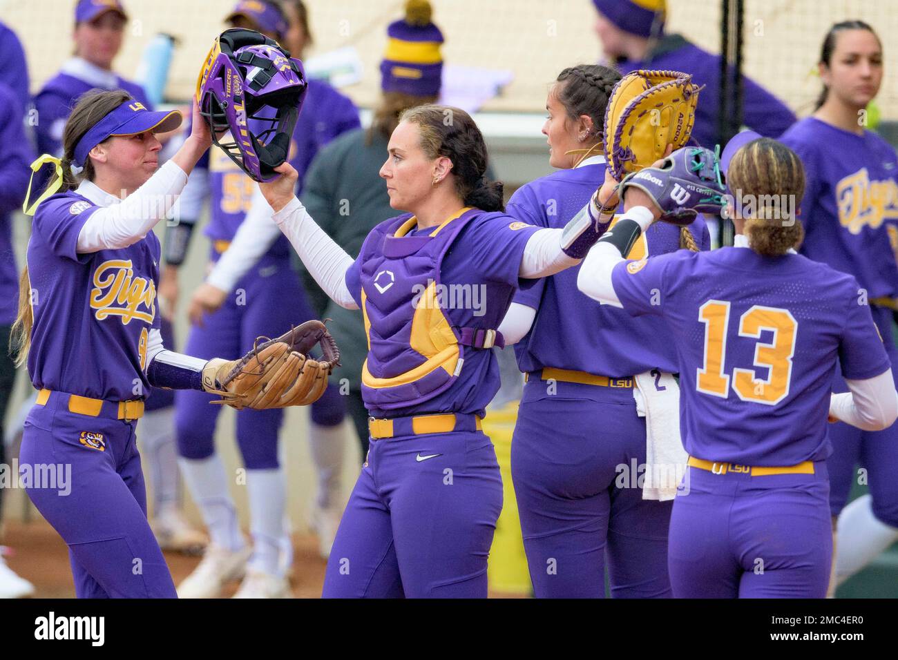 LSU catcher Morgan Cummins (26) celebrates a double play to end the ...