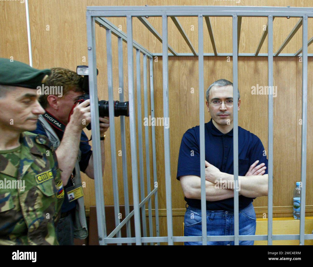 FILE - Former Russian oil giant Yukos CEO Mikhail Khodorkovsky stands ...