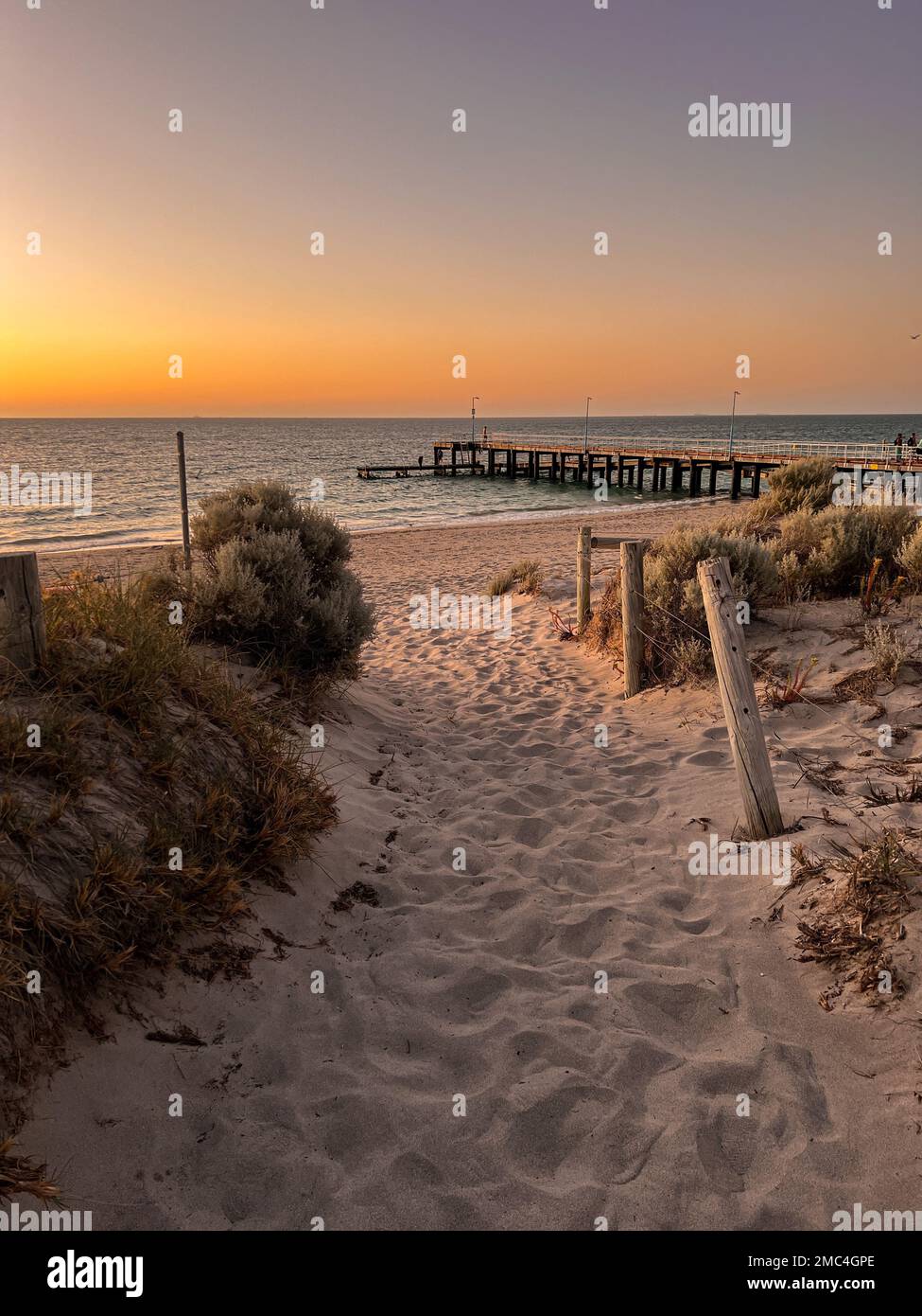 A sandy trail at the beach during the sunset in Perth Western Australia ...