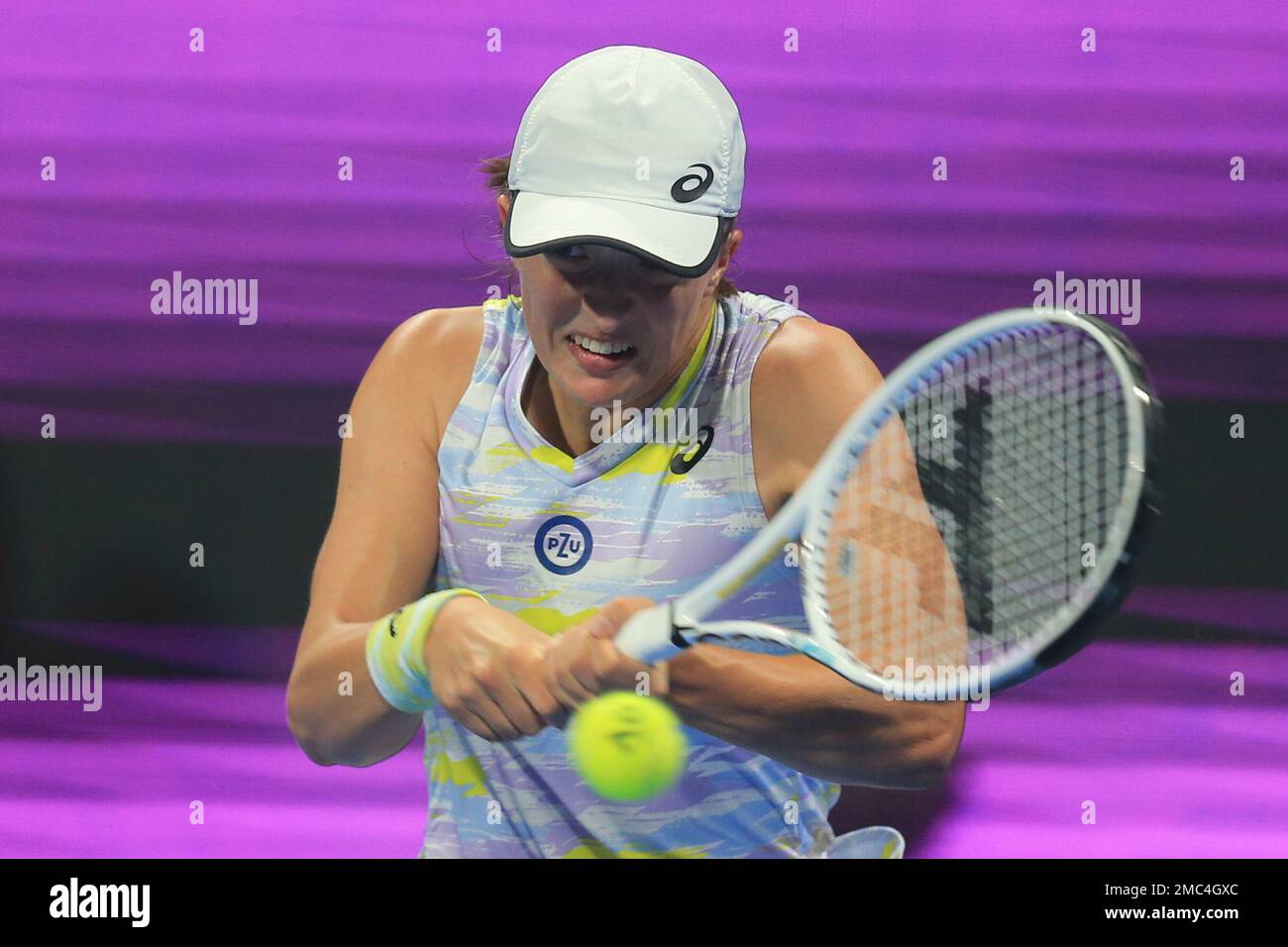 Iga Swiatek of Poland returns during a semi-final match against Maria ...