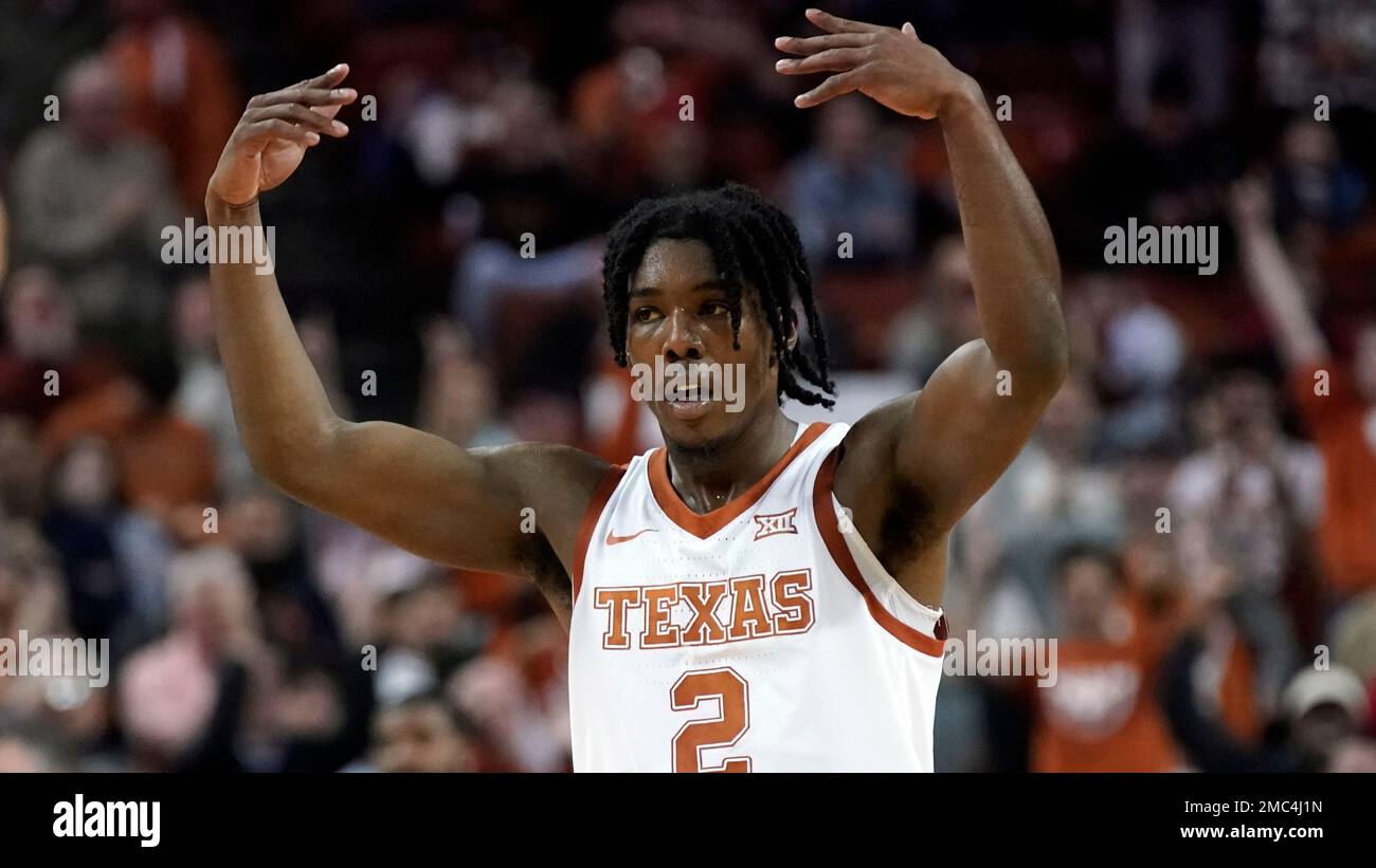 Texas guard Marcus Carr (2) pumps up the crowd against TCU during the ...