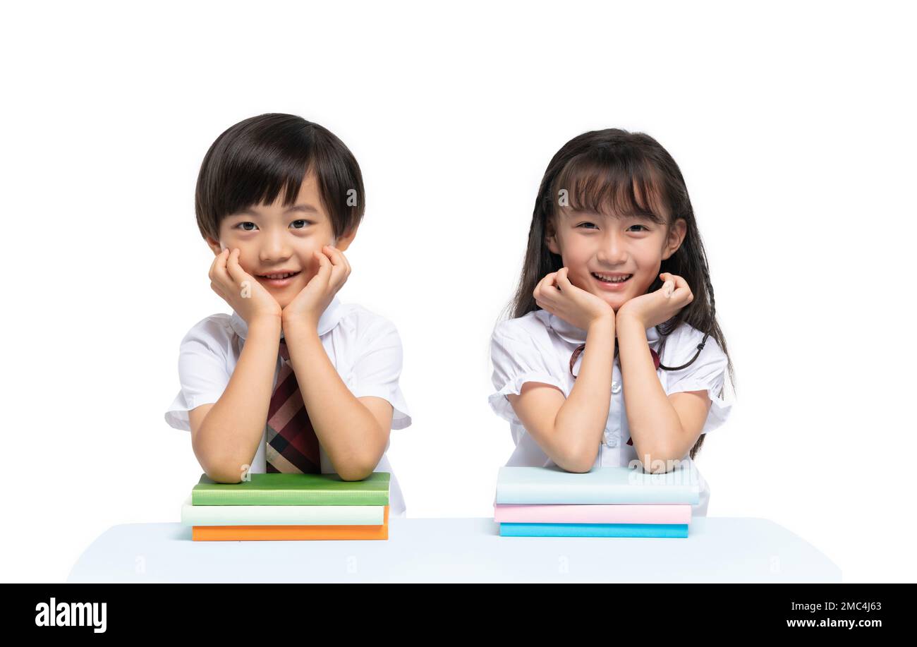 The little boy and little girl in the study Stock Photo - Alamy