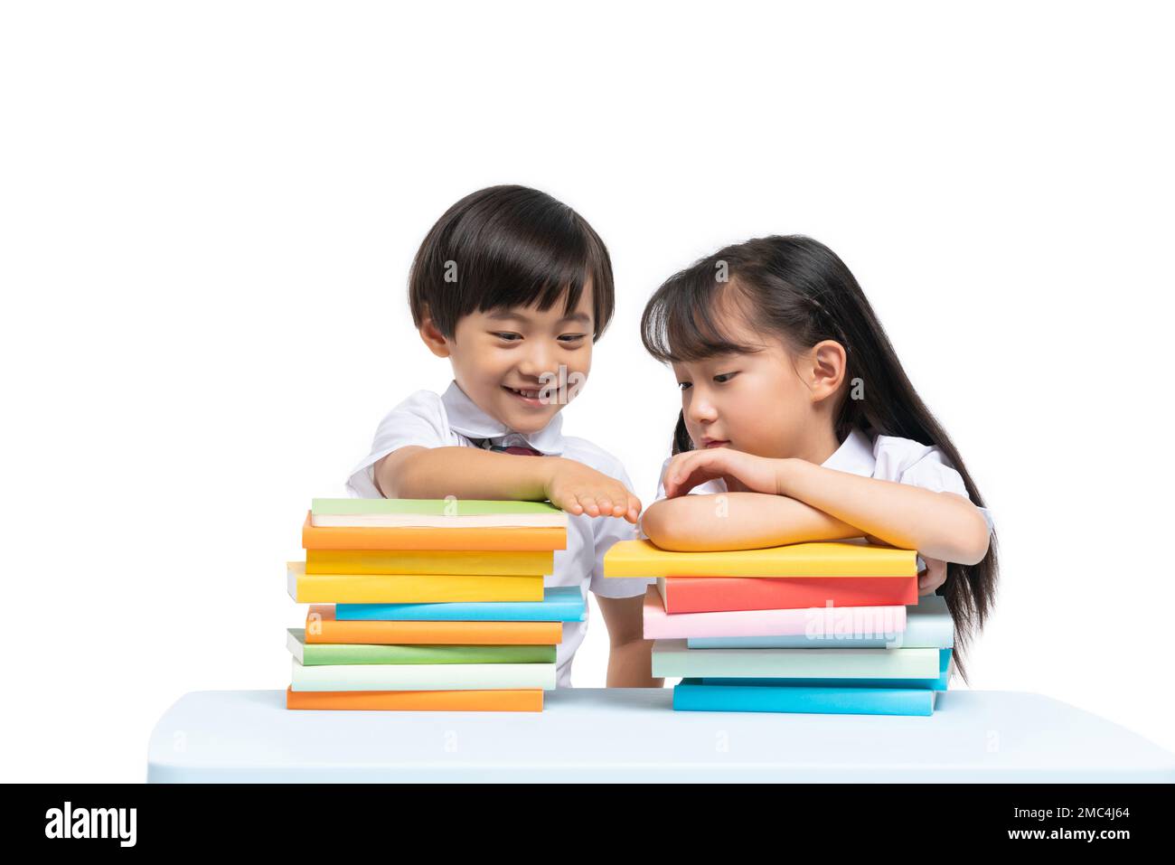 The little boy and little girl in the study Stock Photo - Alamy