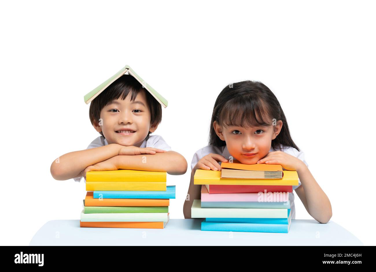 The little boy and little girl in the study Stock Photo - Alamy