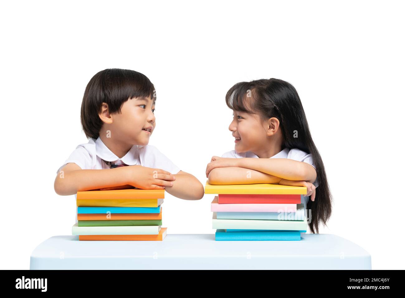 The little boy and little girl in the study Stock Photo - Alamy
