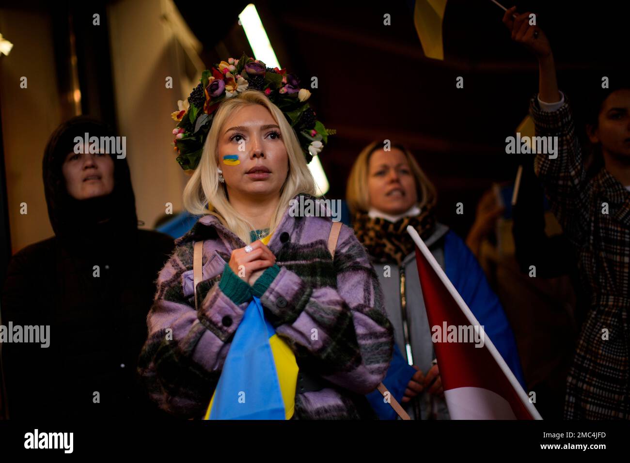 Pro-Ukraine people shout slogans during a protest outside the Russian ...