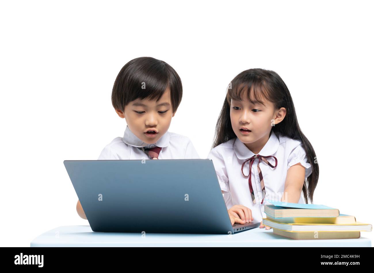 The little boy and little girl in the study Stock Photo - Alamy