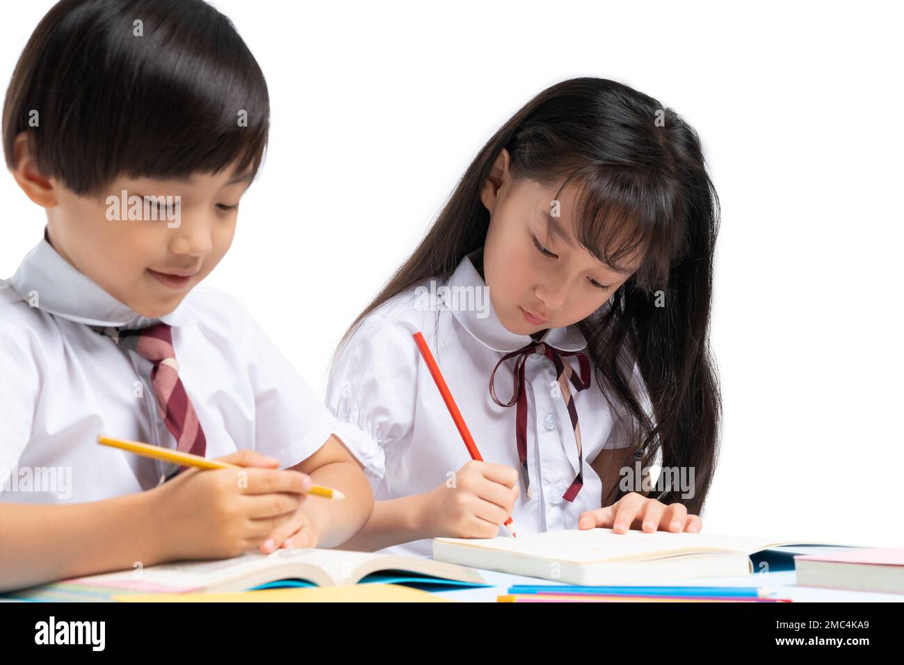 The little boy and little girl in the study Stock Photo - Alamy