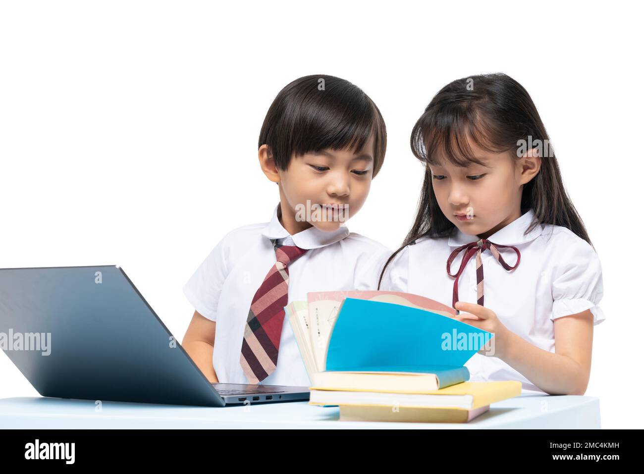 The little boy and little girl in the study Stock Photo - Alamy