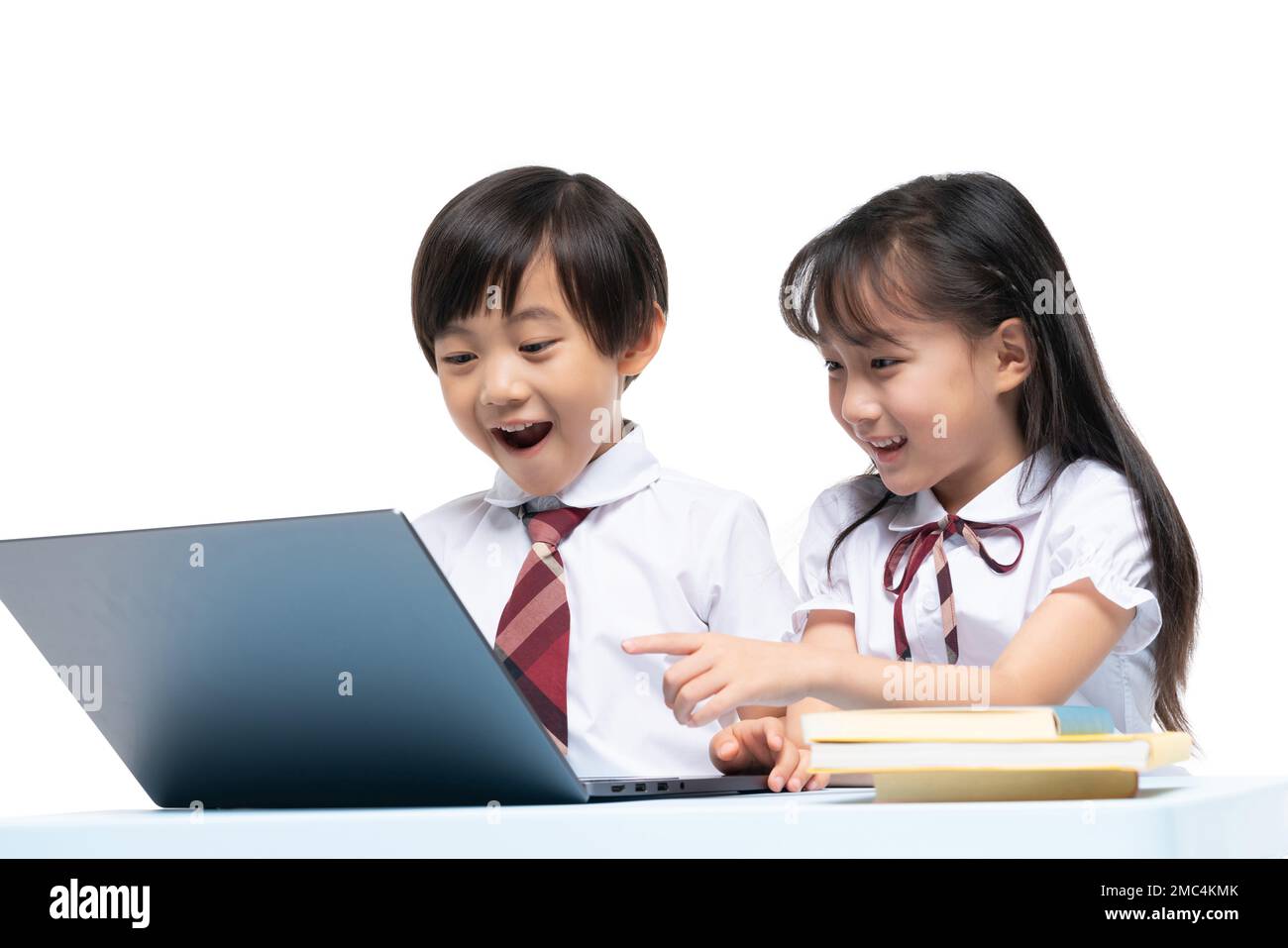 The little boy and little girl in the study Stock Photo - Alamy