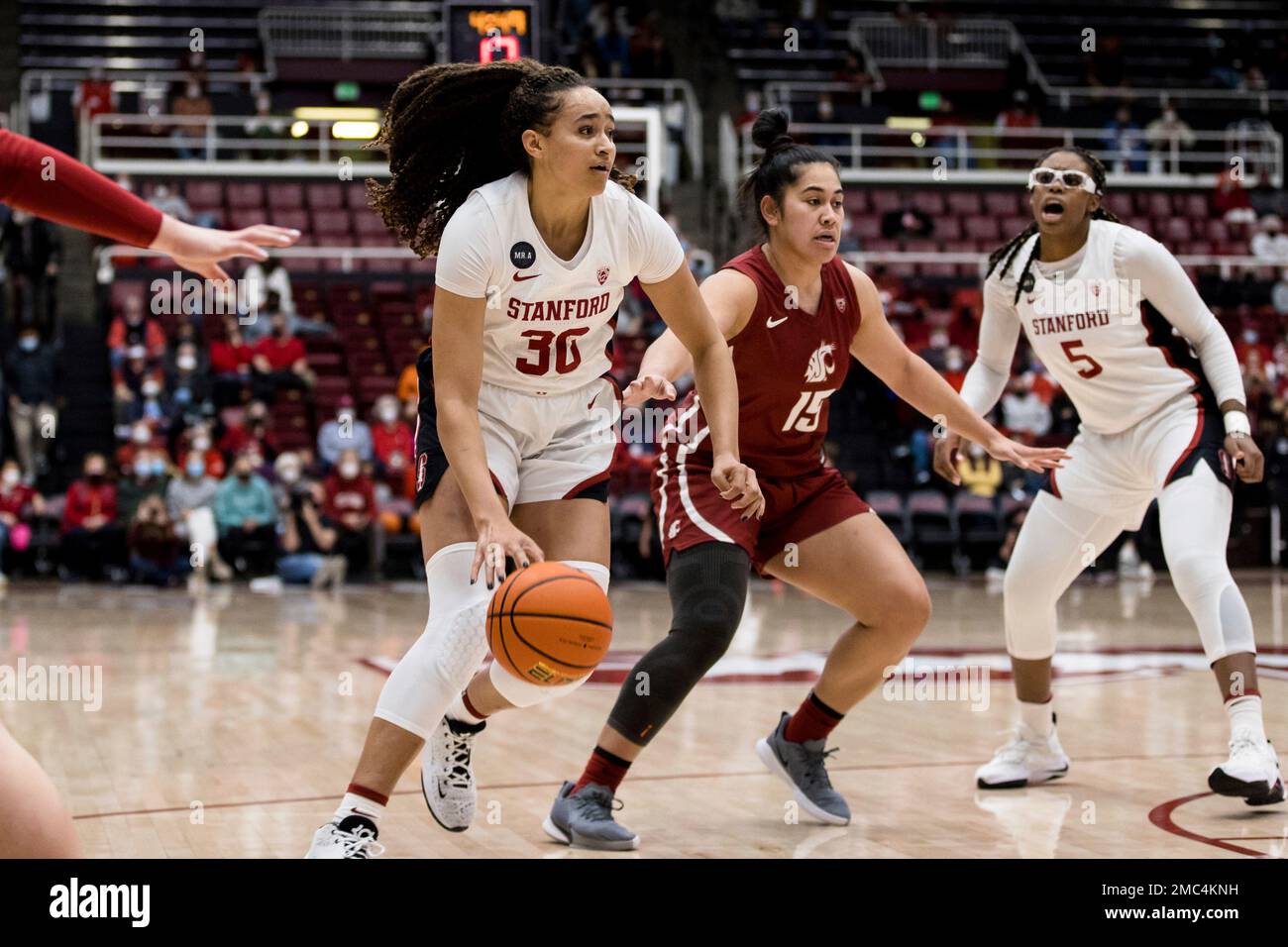 Stanford guard Haley Jones (30) drives past Washington State forward ...