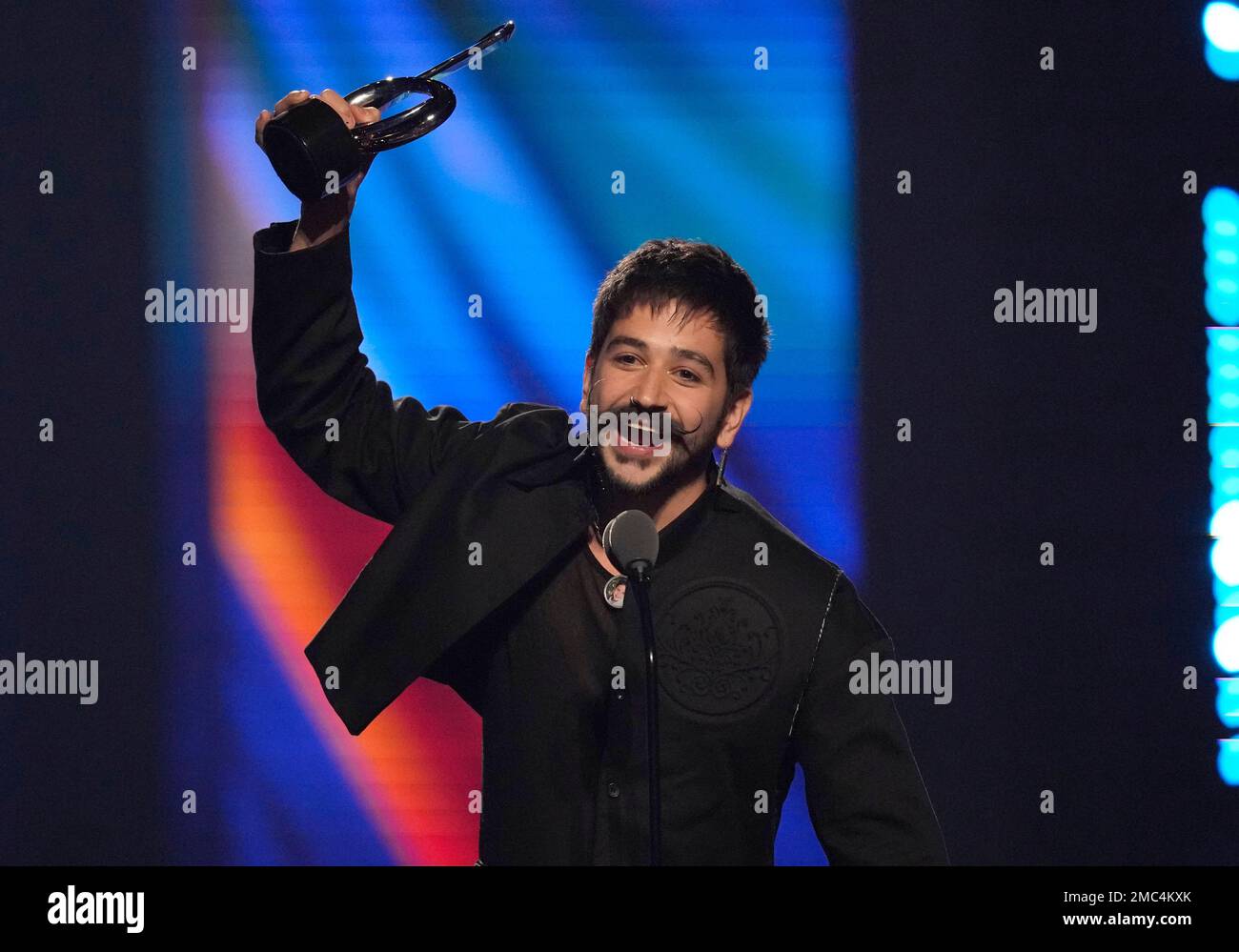Camilo accepts the award for pop artist of the year at Premio Lo ...