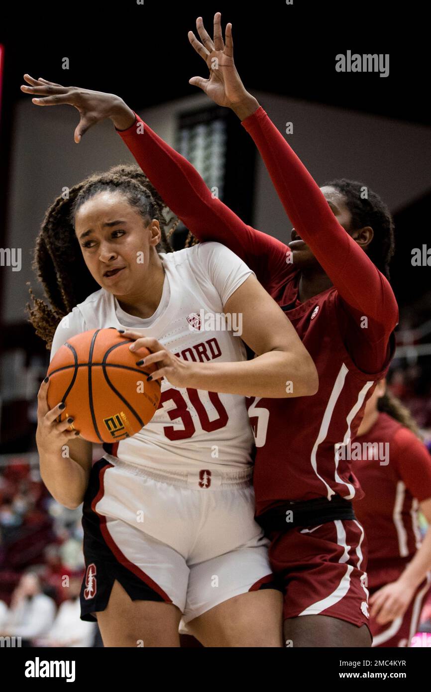 Washington State center Bella Murekatete, obscured, guards Stanford ...