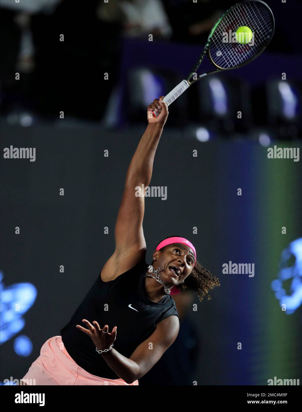 Hailey Baptiste of the United States serves against Camila Osorio of ...