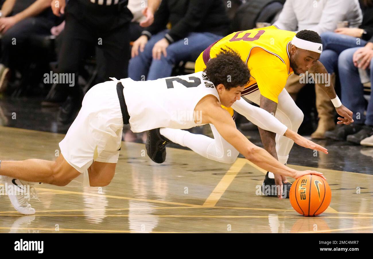 Colorado guard KJ Simpson, front, and Arizona State guard Marreon ...