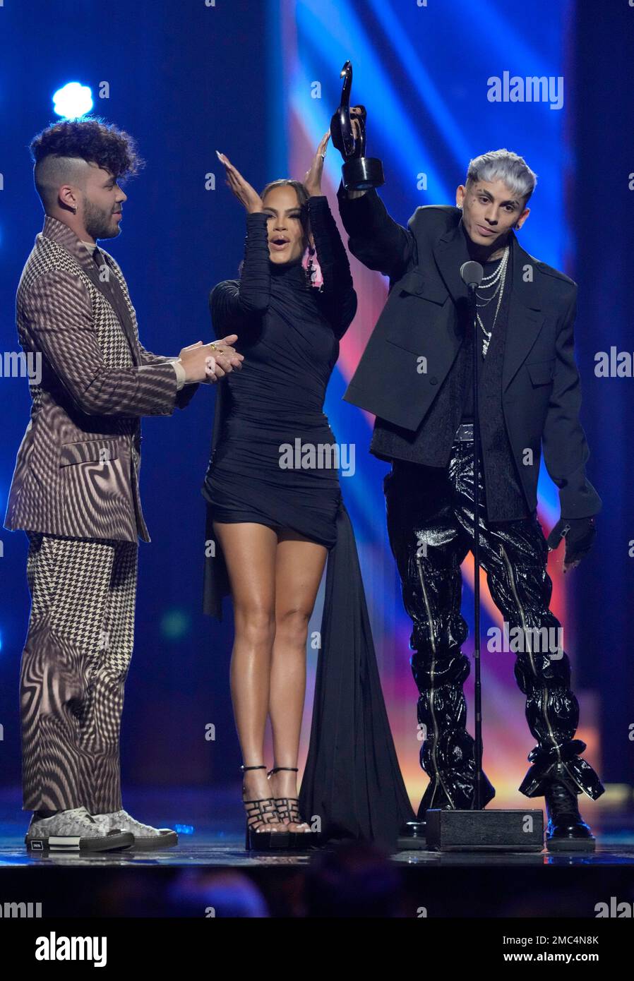 Prince Royce, from left, Natti Natasha and Khea accept the award for ...