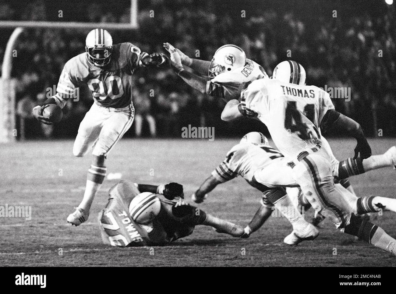 FILE - Miami Dolphin defenders Vern Den Herder and Norris Thomas (41 ...