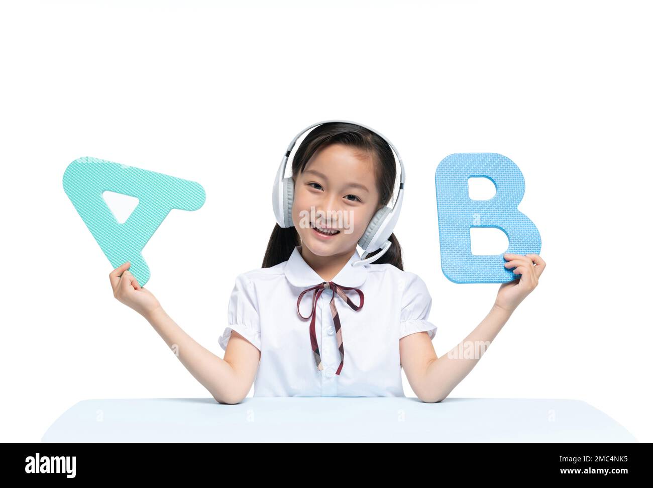 Elementary school students in learning Stock Photo - Alamy